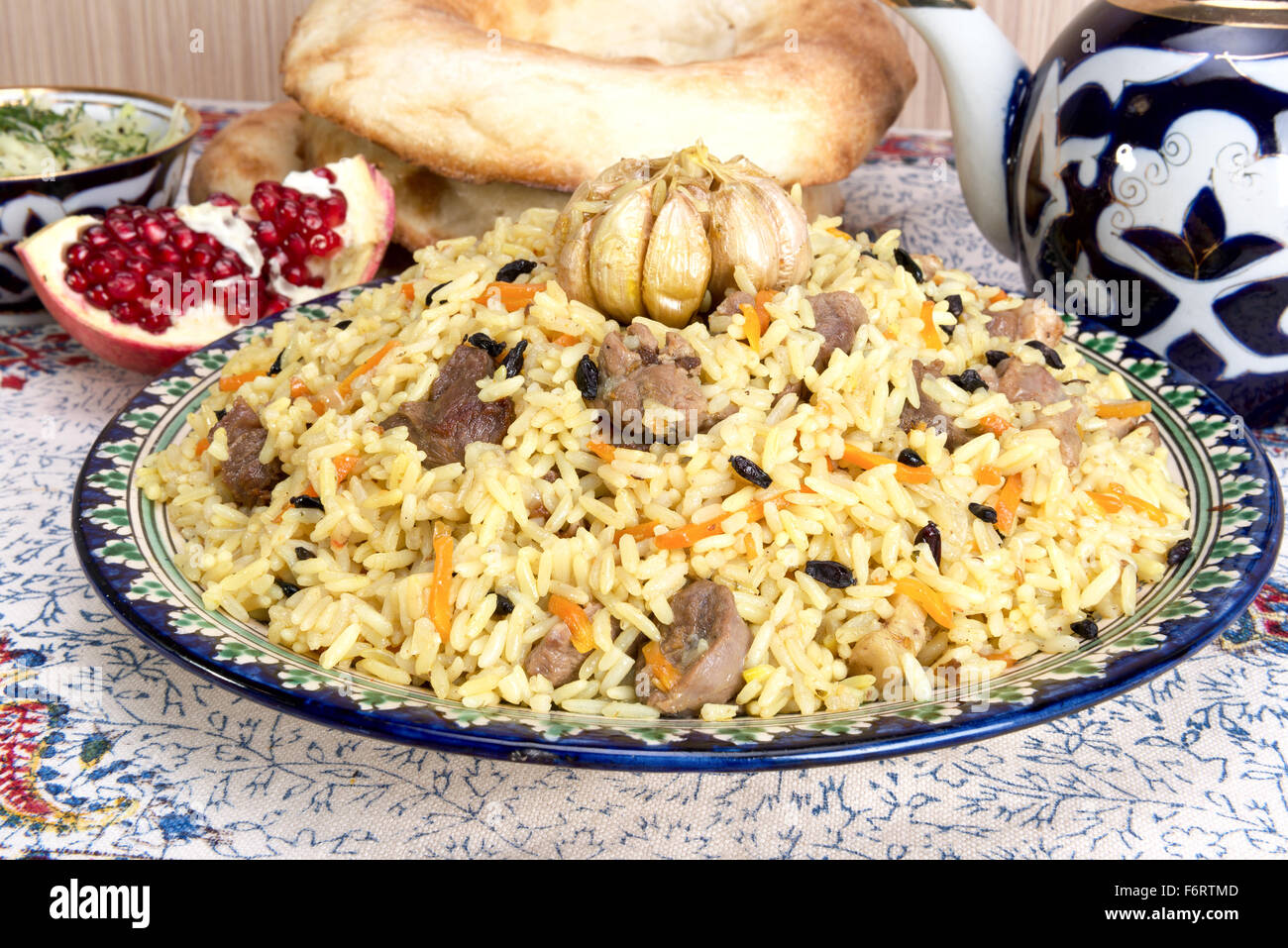 Pilaf - Eastern dish of rice cooked with oil meat and spices Stock ...