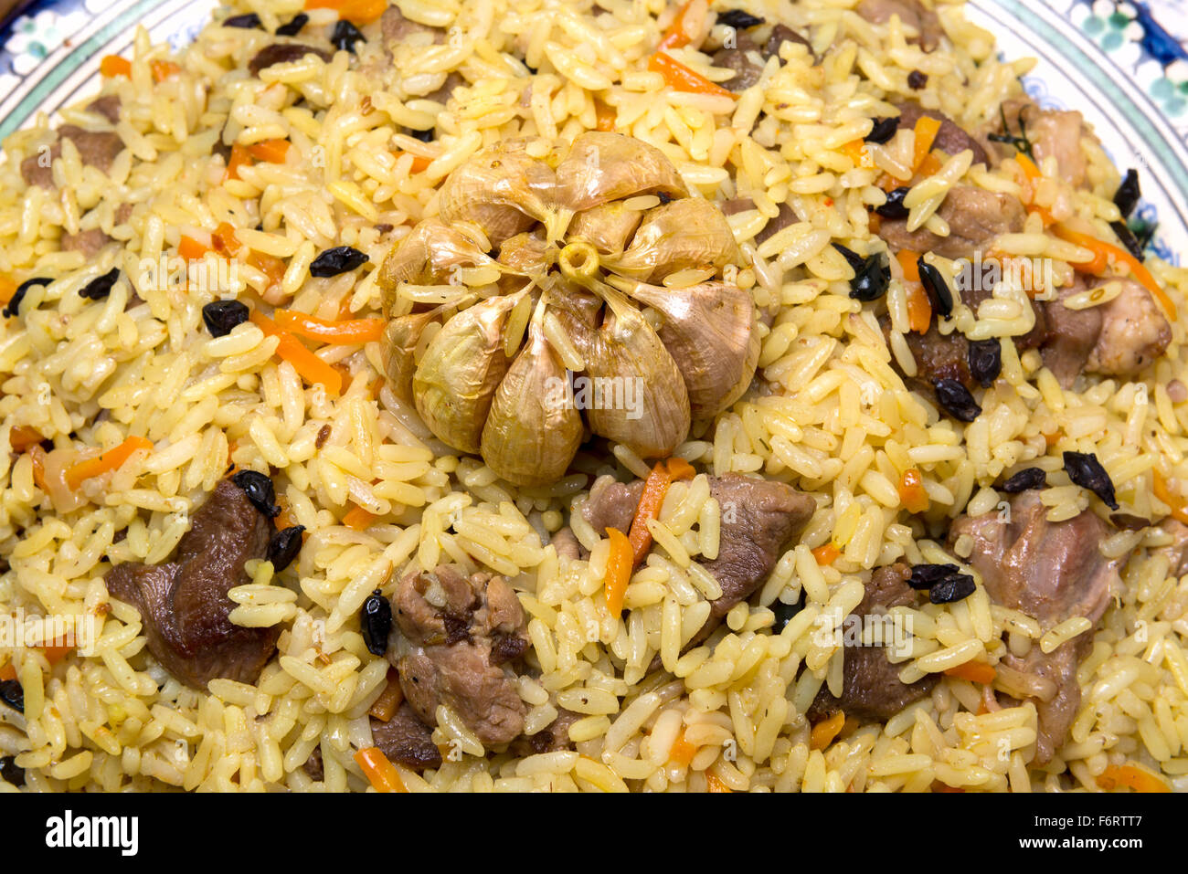 Pilaf - Eastern dish of rice cooked with oil meat and spices Stock ...