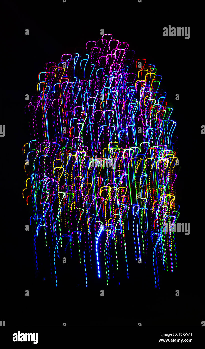 An image of a Christmas tree taken with a slow shutter speed for an ...