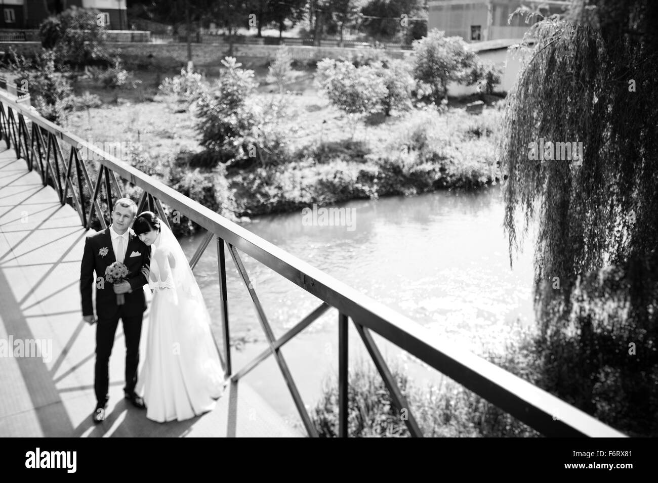 wedding couple at the metall bridge Stock Photo - Alamy