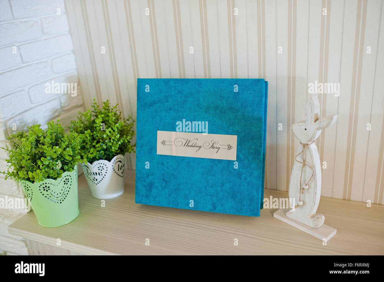blue aqua velvet wedding photobook and album Stock Photo - Alamy