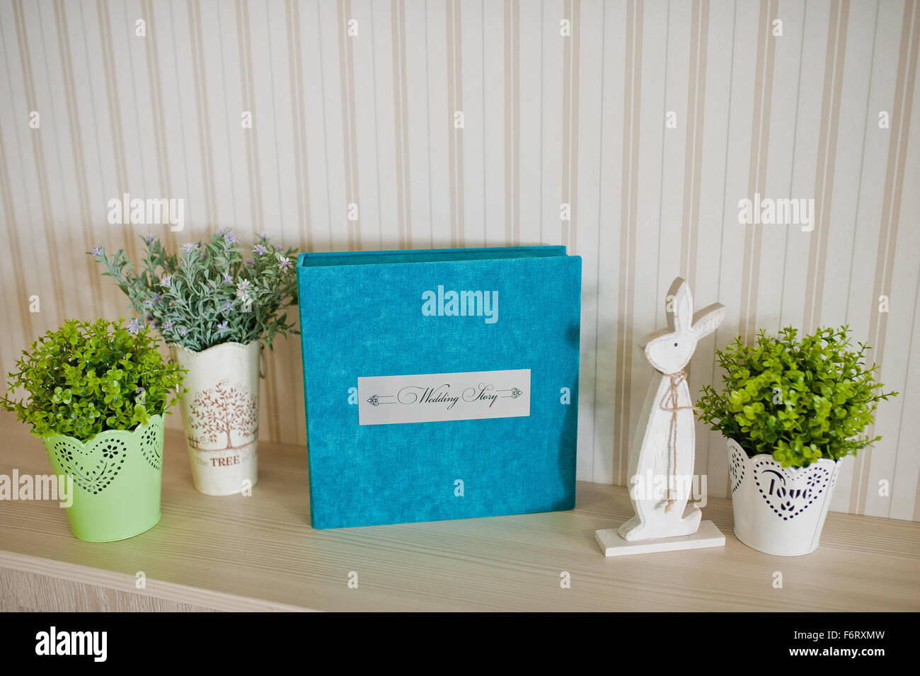 blue aqua velvet wedding photobook and album Stock Photo - Alamy