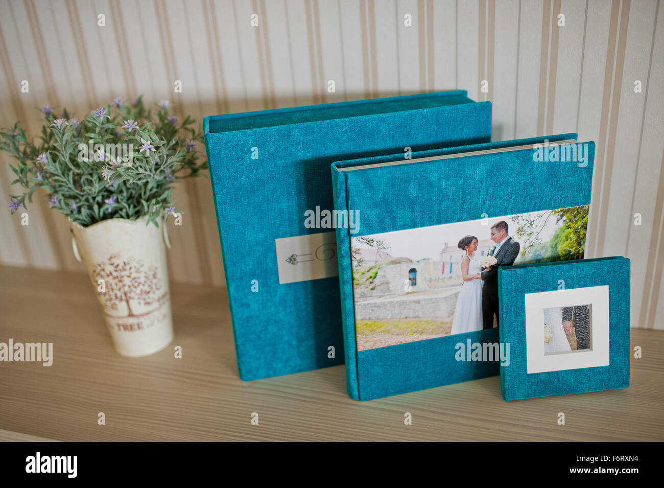 blue aqua velvet wedding photobook and album Stock Photo - Alamy