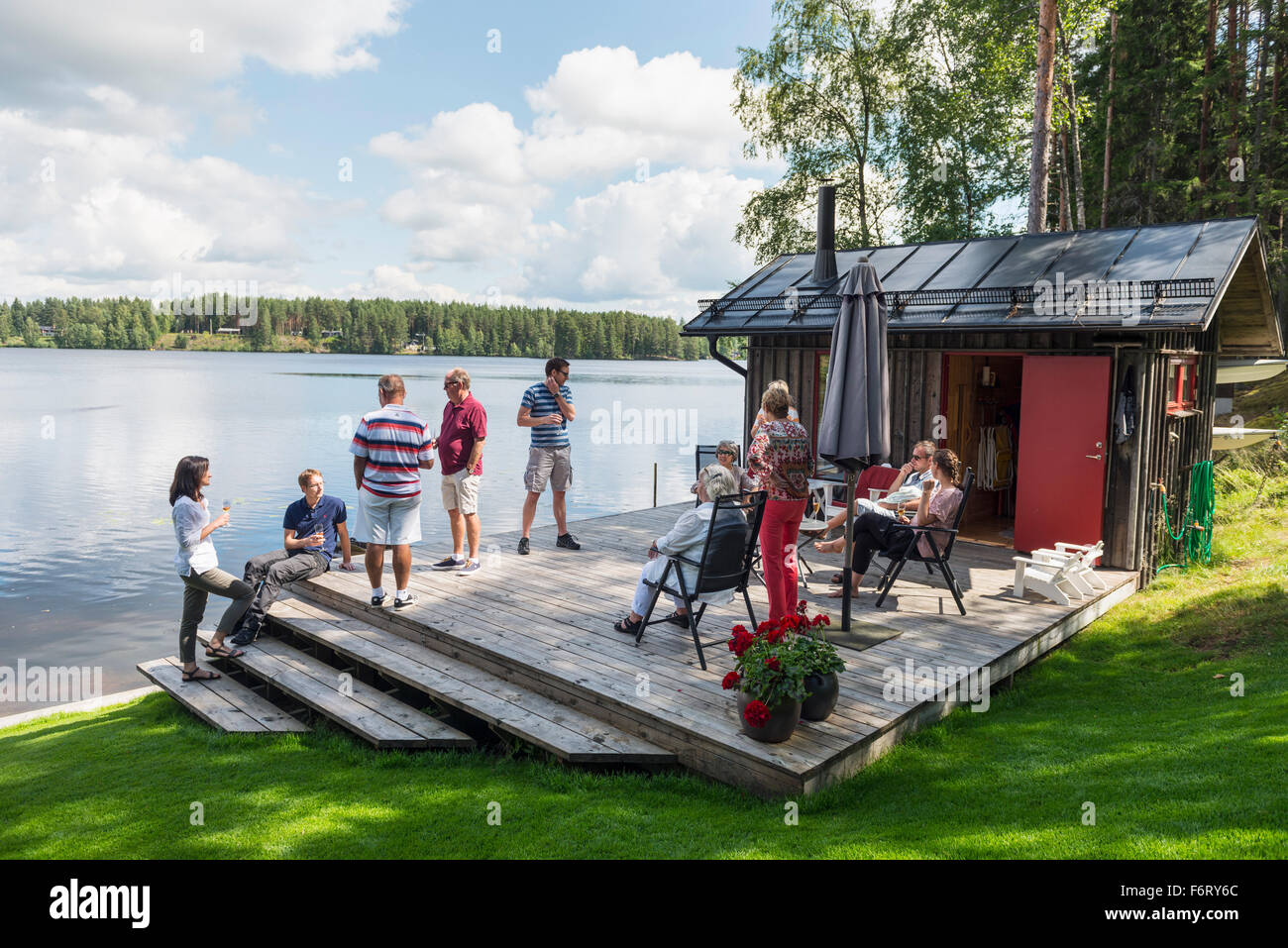 Summer gathering by the lake Stock Photo - Alamy