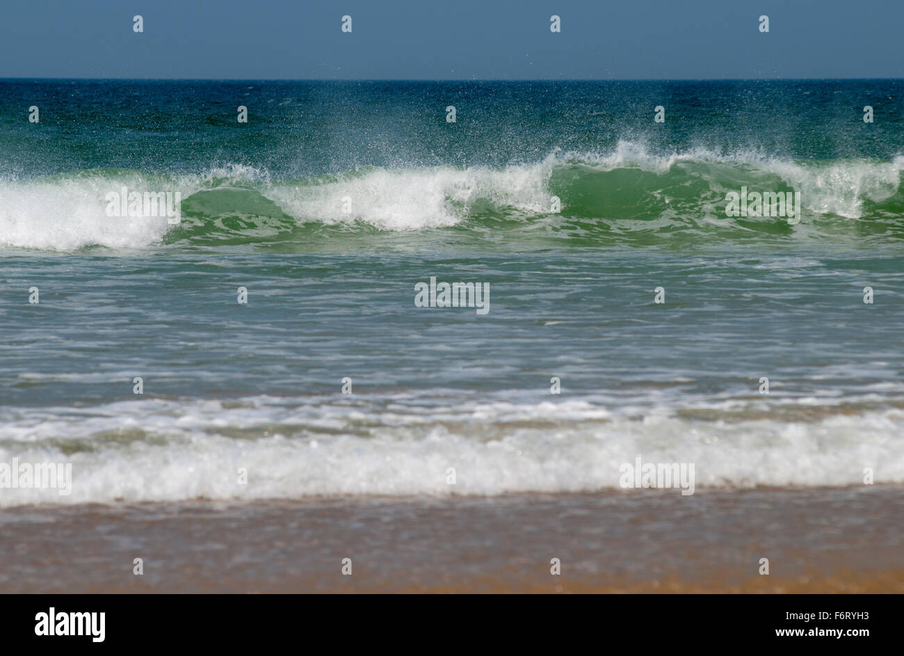 Waves crashing onto a beach in Cornwall, England, UK Stock Photo - Alamy