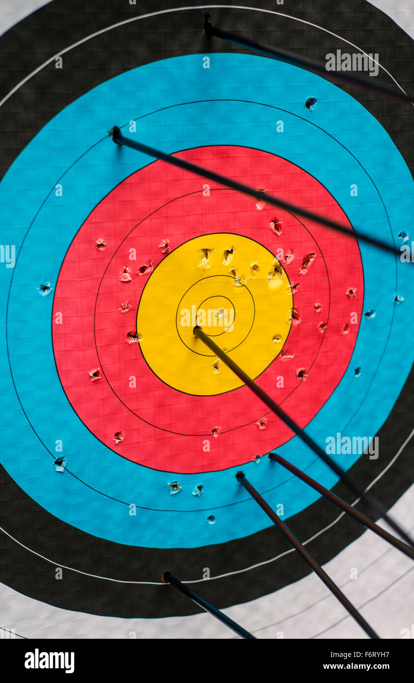 Arrows in a target Stock Photo - Alamy