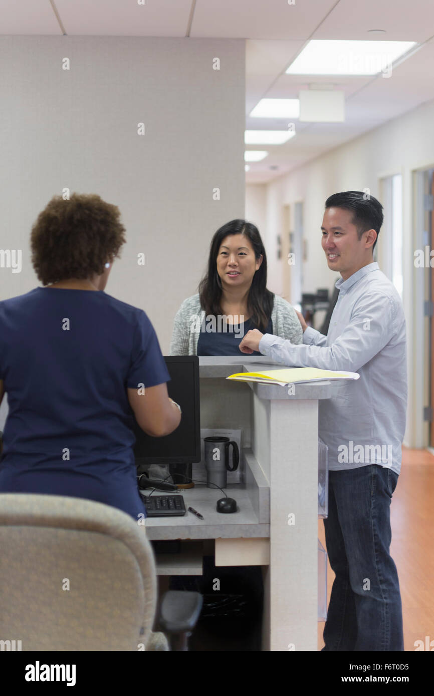Nurse and patients talking in hospital Stock Photo - Alamy