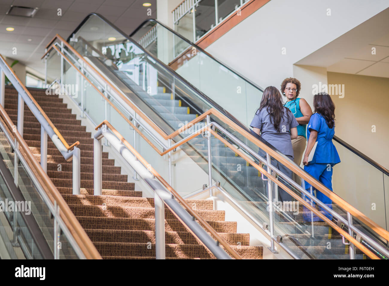 Nurses and doctor on hospital steps Stock Photo - Alamy