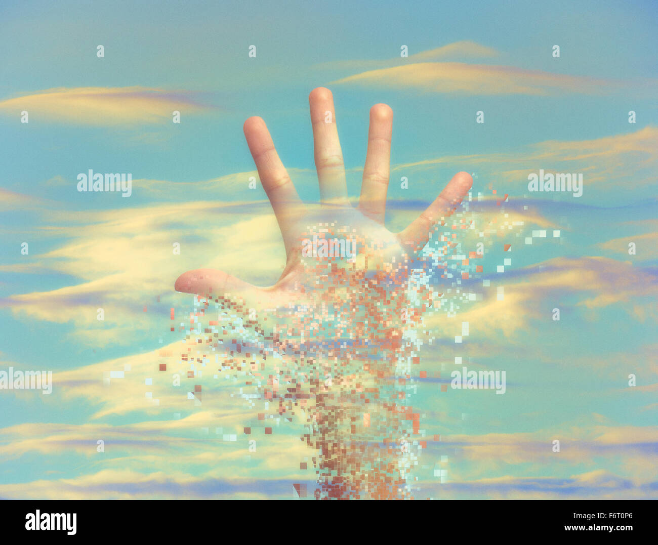 Pixelated hand dissolving in sky Stock Photo - Alamy