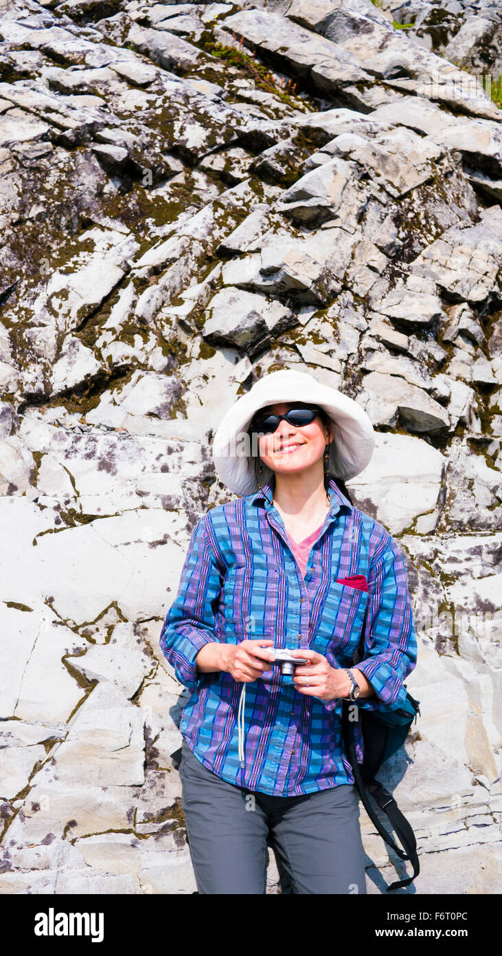 Japanese tourist photographing rock formation Stock Photo - Alamy