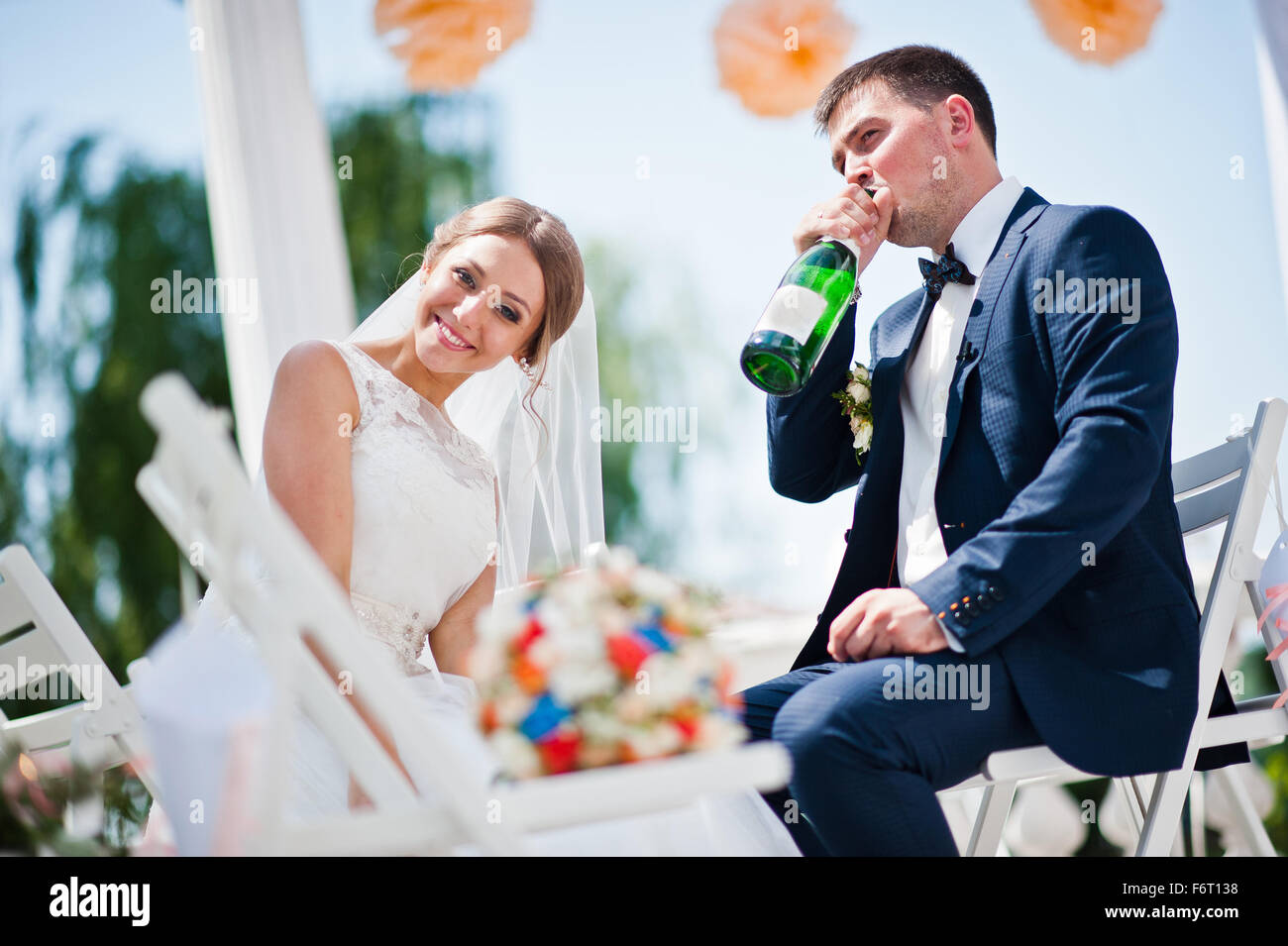 drinking champagne groom Stock Photo - Alamy