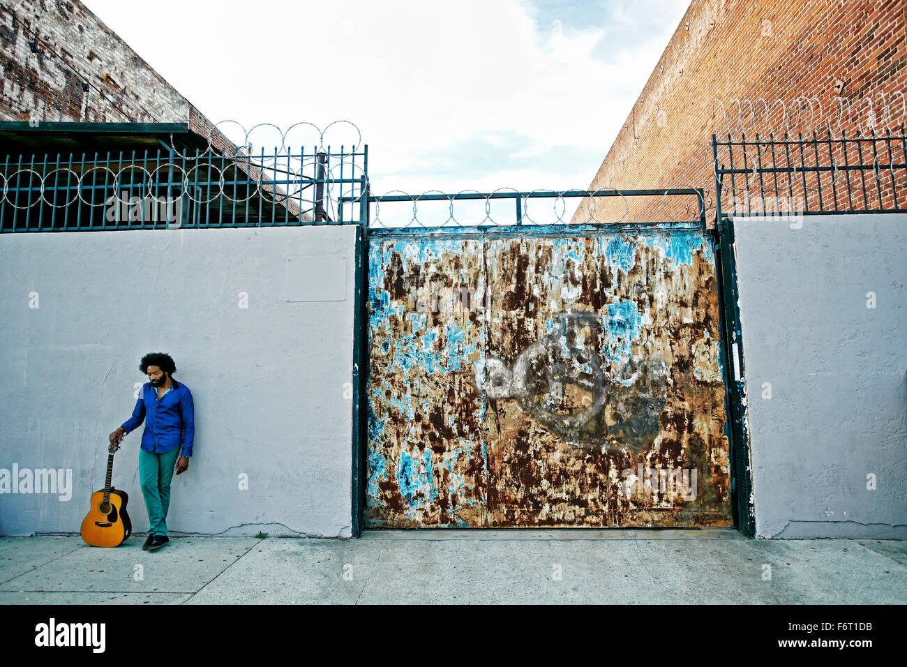 Man standing outside gate hi-res stock photography and images - Alamy