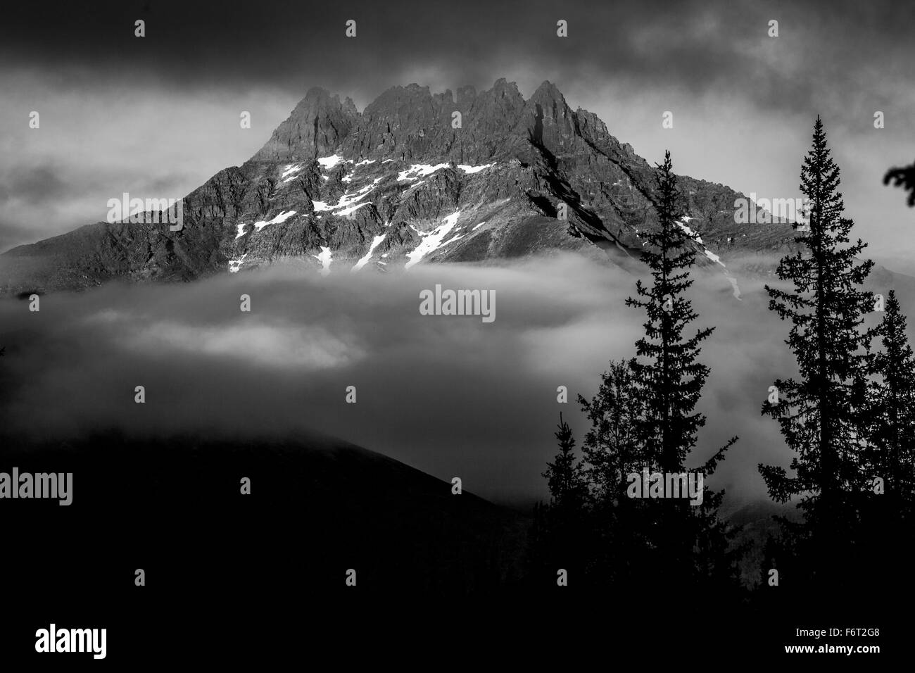 Mountain and clouds in remote landscape Stock Photo - Alamy