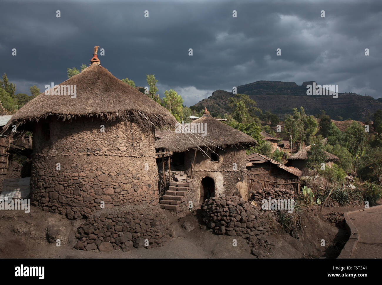 Village huts on remote hillside Stock Photo - Alamy