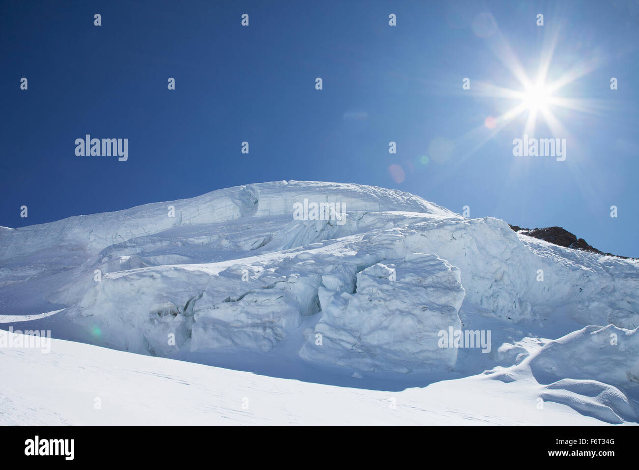 Sunshine over snow drift Stock Photo - Alamy