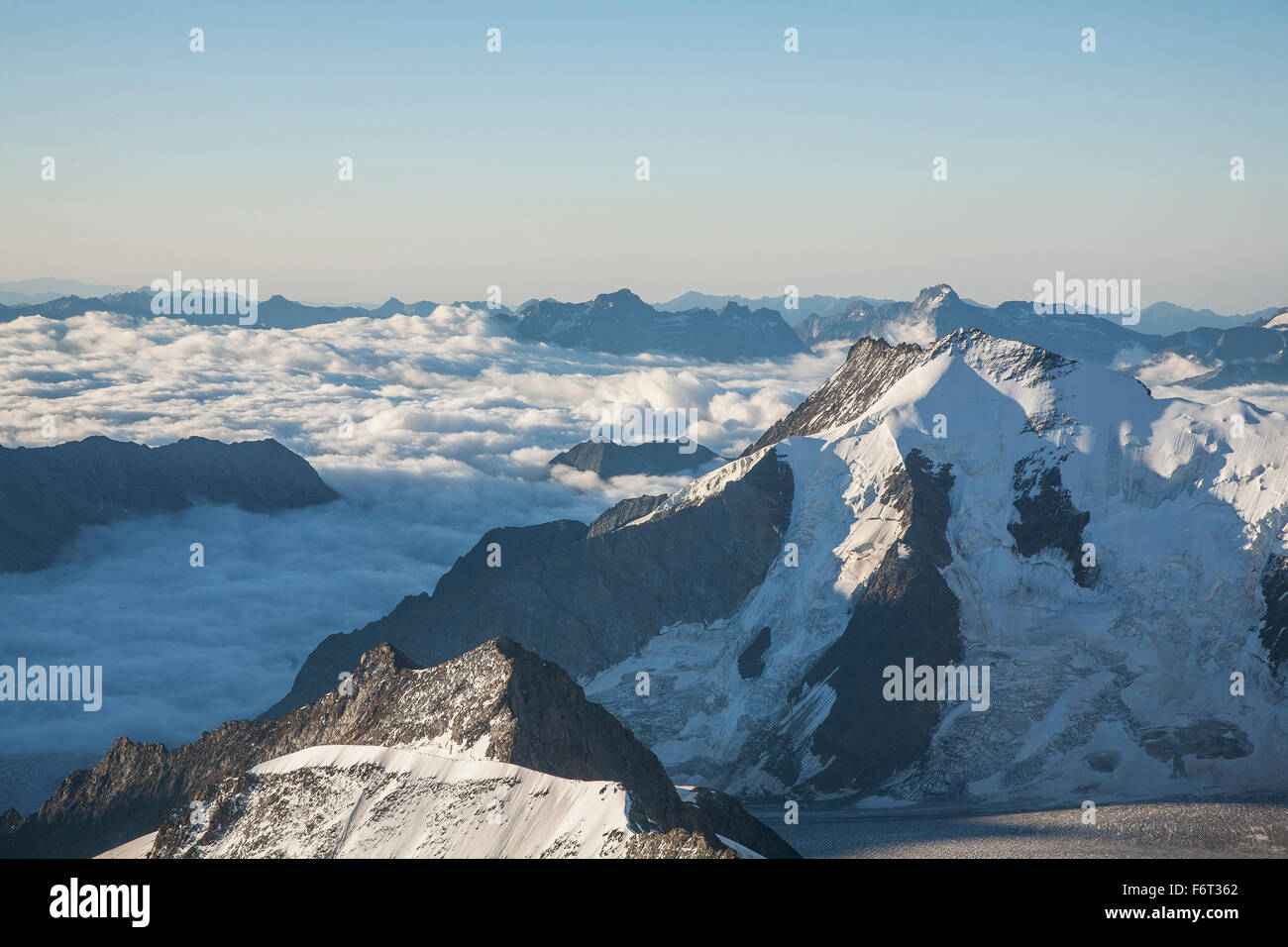 Snowy mountaintops in remote landscape Stock Photo - Alamy
