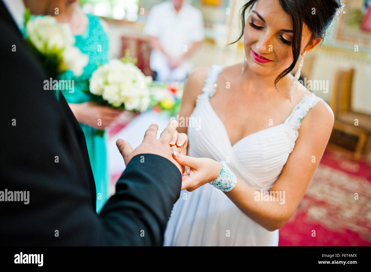 Wedding ring exchange Stock Photo - Alamy