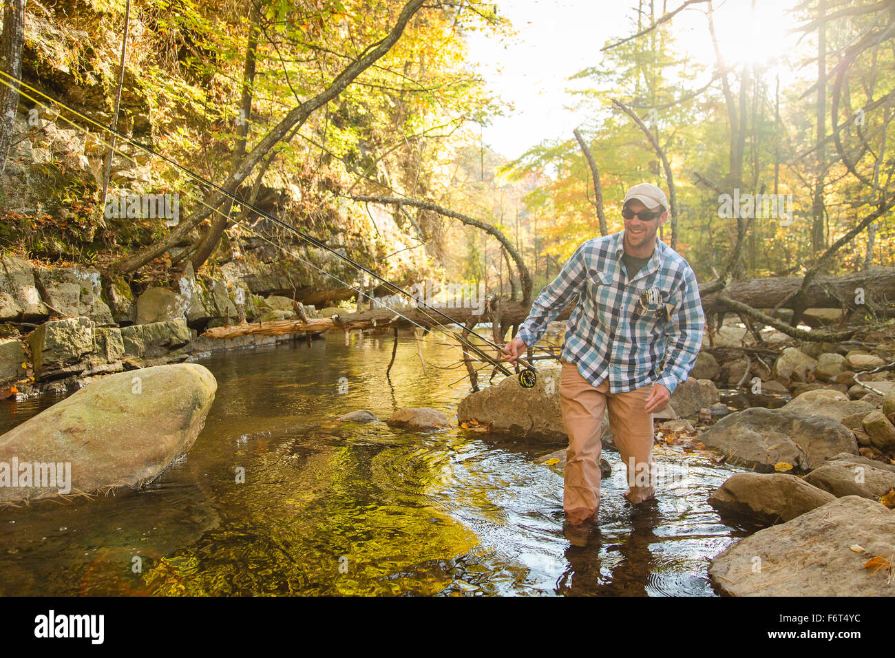 Man fisher walking rod hi-res stock photography and images - Alamy