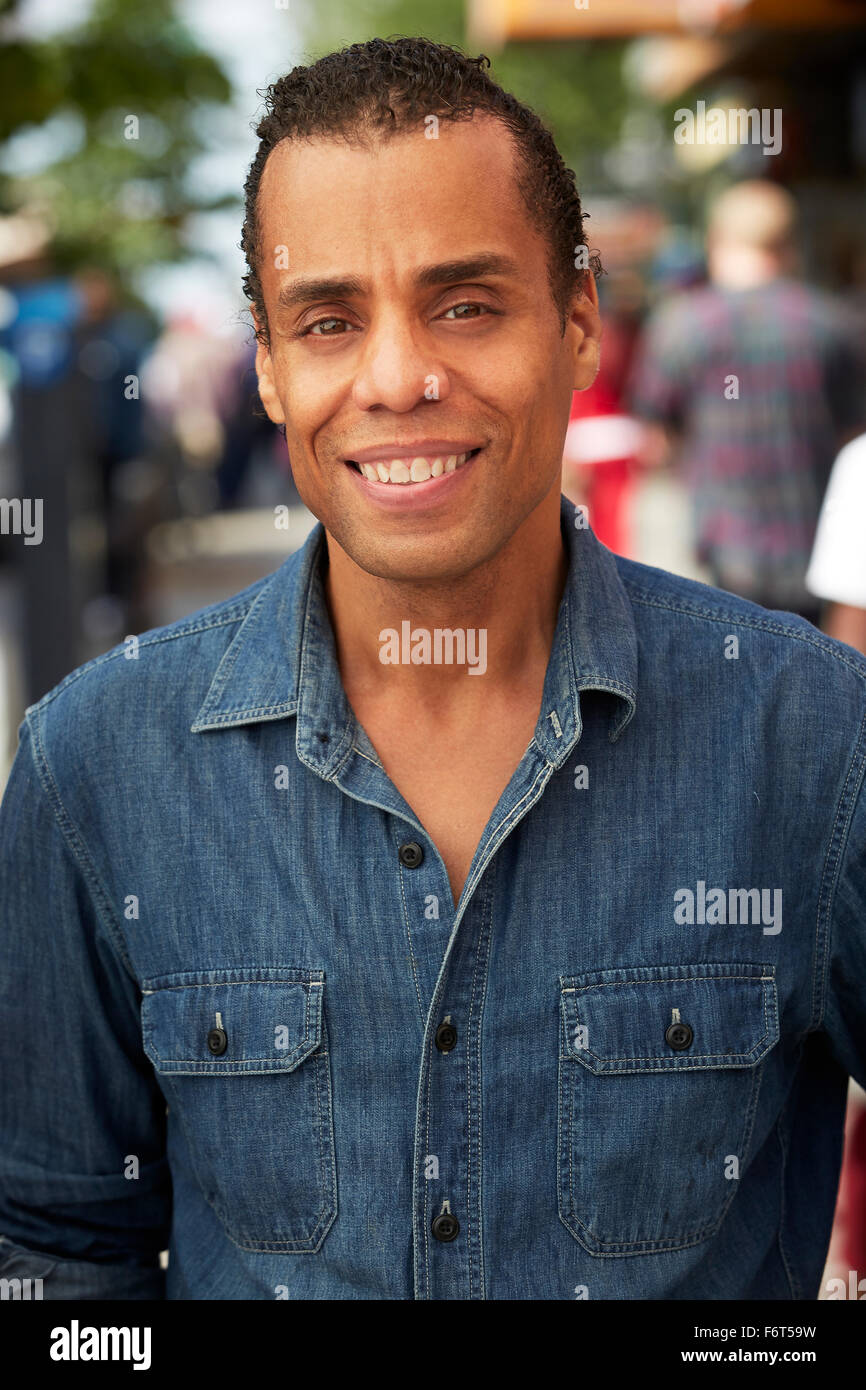 Mixed race man smiling Stock Photo - Alamy