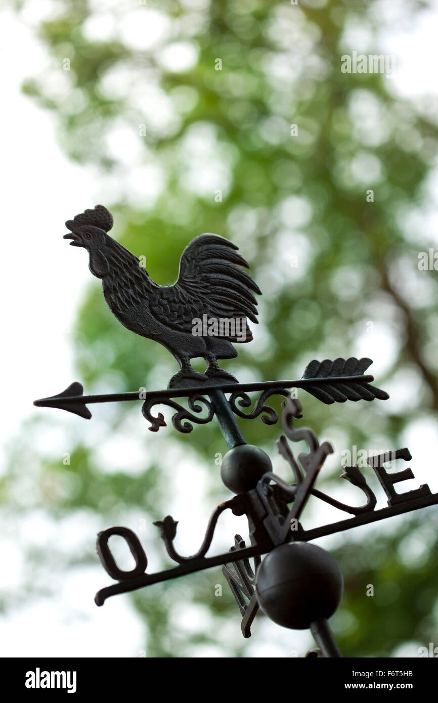 Metal weathercock on a roof in a park Stock Photo - Alamy