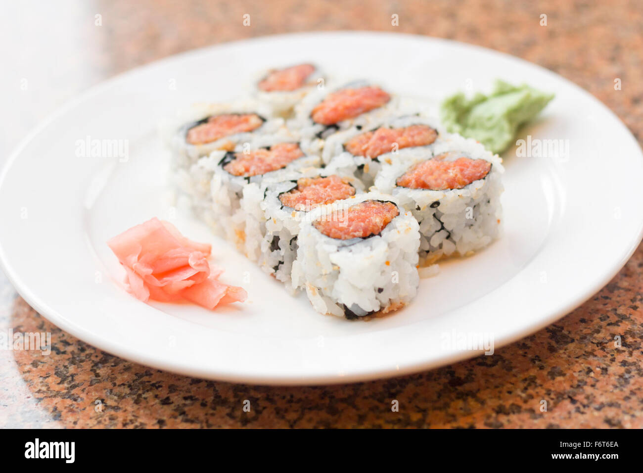 Spicy tuna roll Toro Maki sushi roll with wasabi sauce and pickled ...