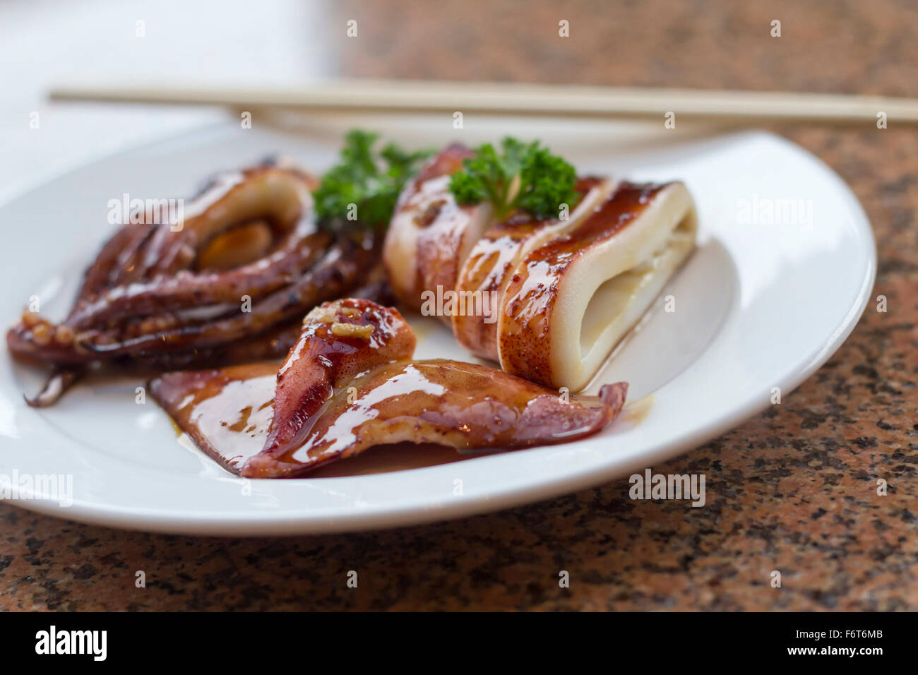 Squid legs hi-res stock photography and images - Alamy