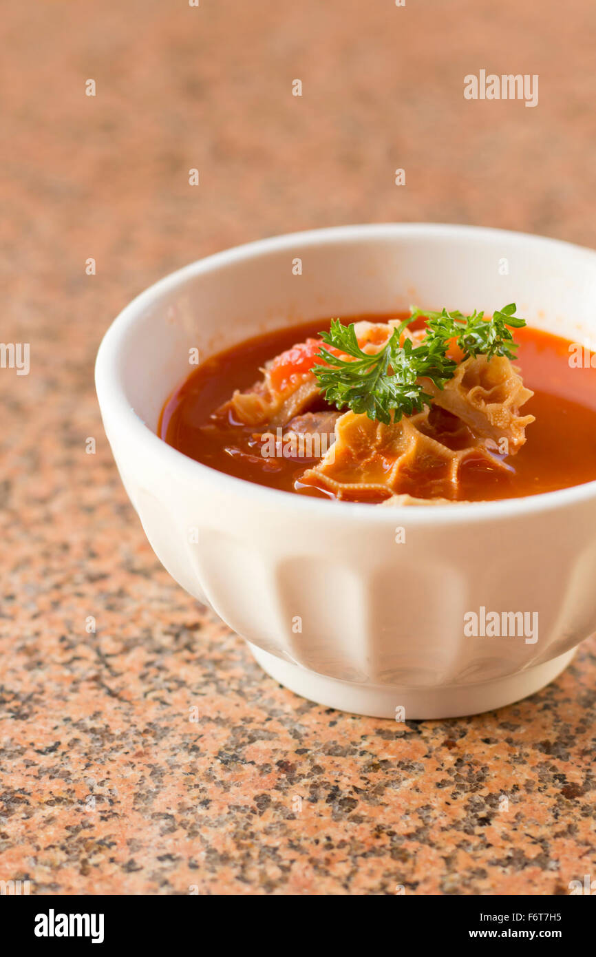 Trippa Alla Roma Tripe soup with red tomato sauce and parsley Stock ...