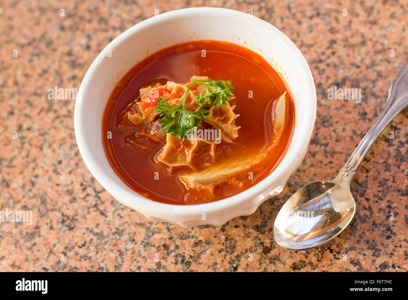 Trippa Alla Roma Tripe soup with red tomato sauce and parsley Stock ...