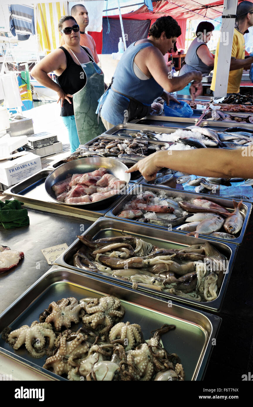 Choosing fresh fish at the fish market of Marsaxlokk, Malta Stock Photo ...