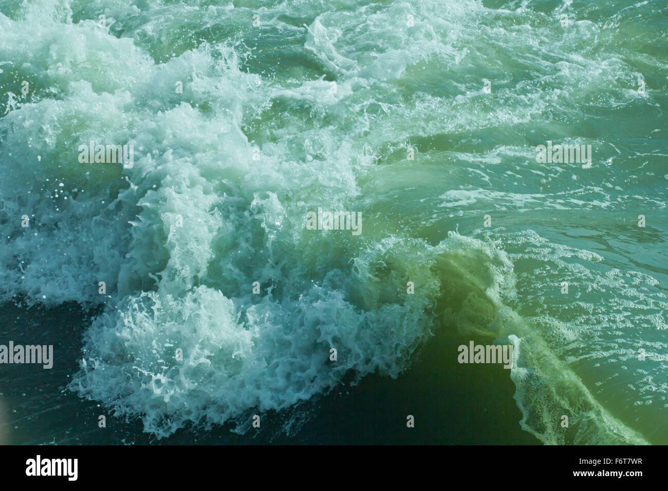 Colorful blue ocean waves in closeup tropical imagery Stock Photo - Alamy