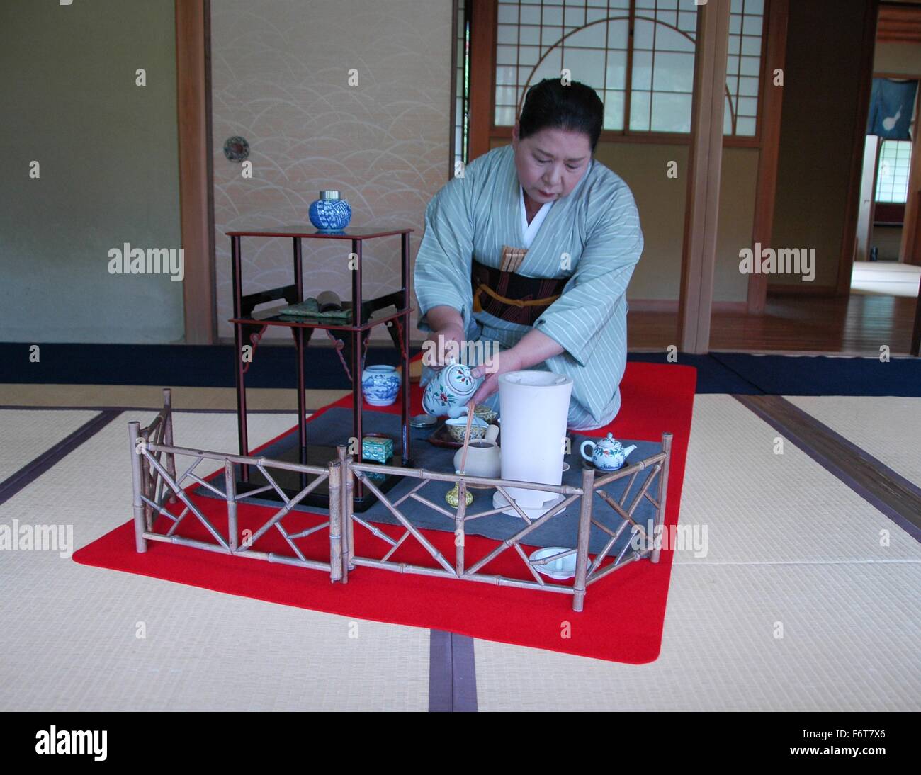 At a tea house in Japan, the host prepares green tea in a tea ceremony ...