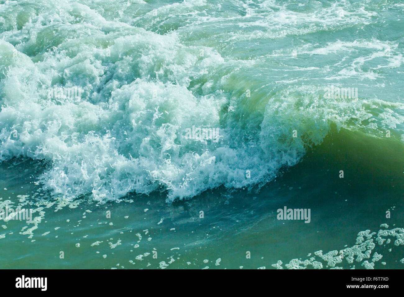 Colorful blue ocean waves in closeup tropical imagery Stock Photo - Alamy