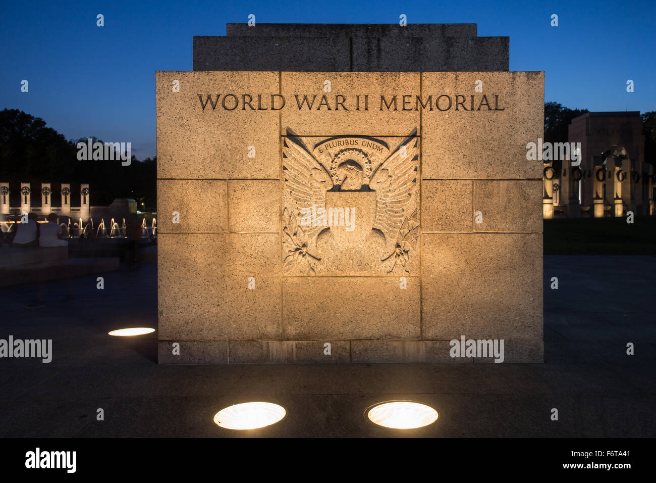 Night view of memorial stone at the World World II Memorial in ...
