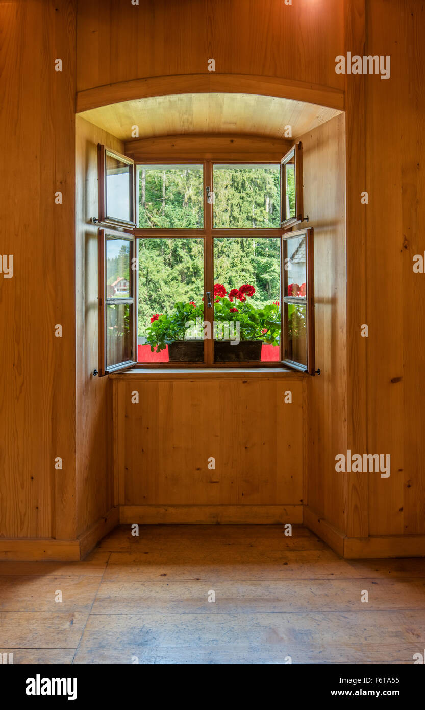 Open Window with Flowers in Wooden Interior Stock Photo - Alamy