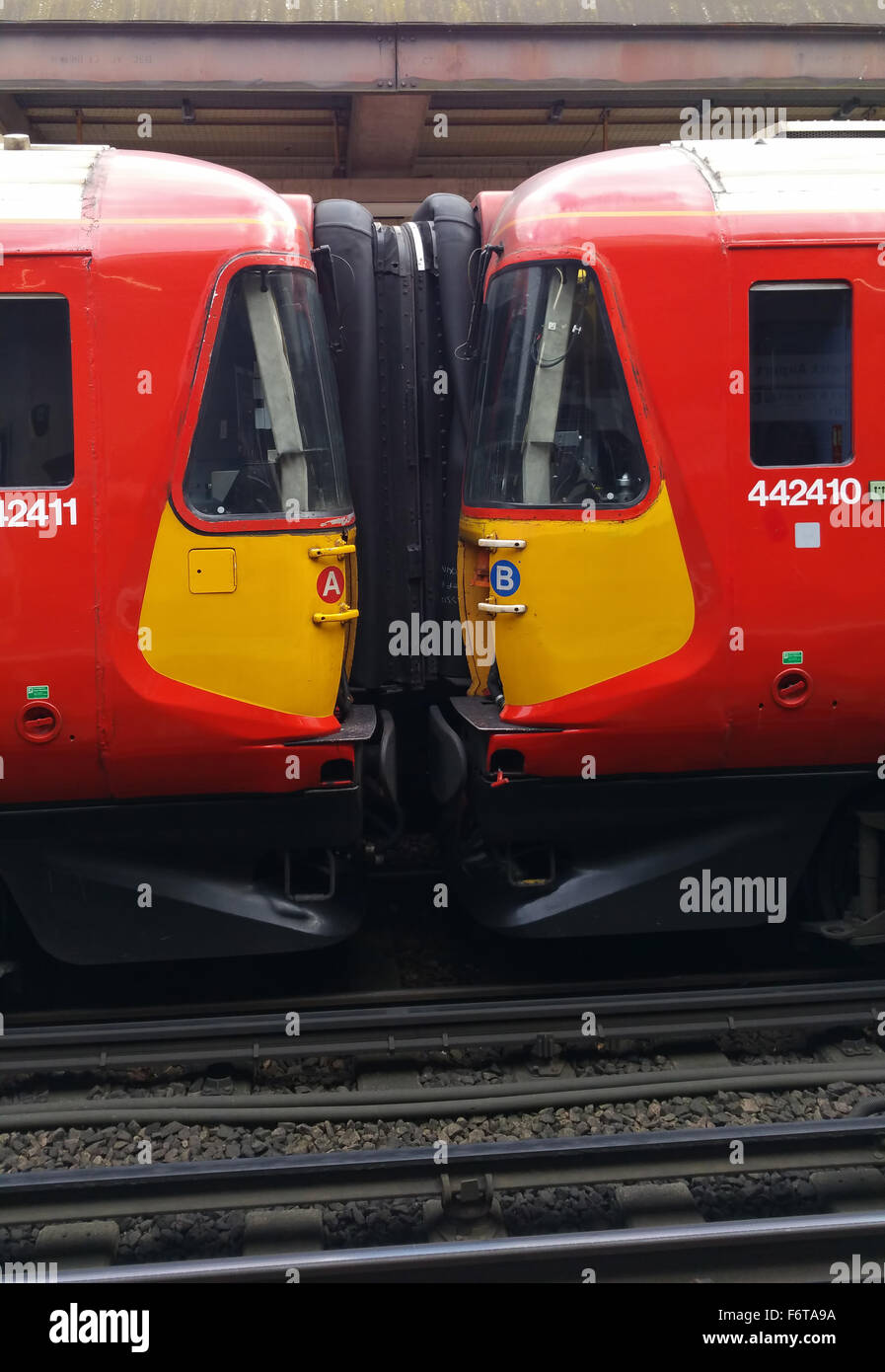 Train cars joined with bellows Stock Photo - Alamy