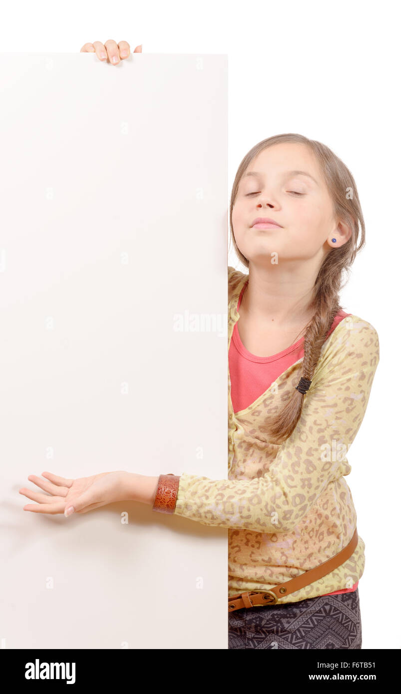 a beautiful young girl with a blank poster isolated on white background ...
