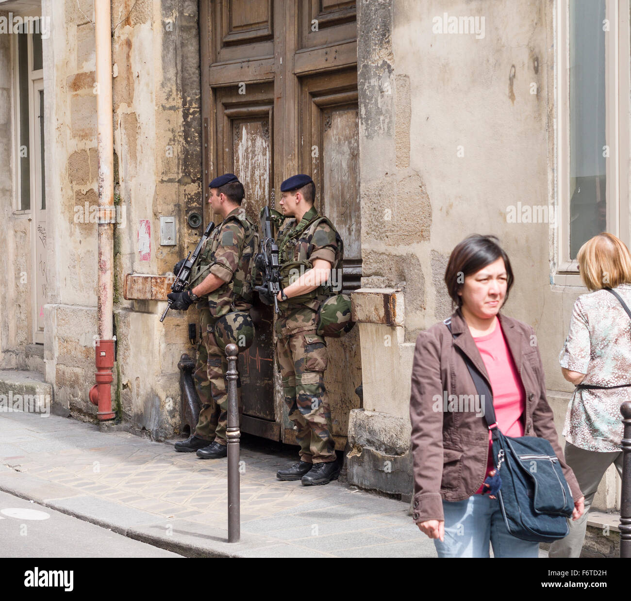 Armed Soldiers Guard Buildings in the Marais district of Paris . Two ...