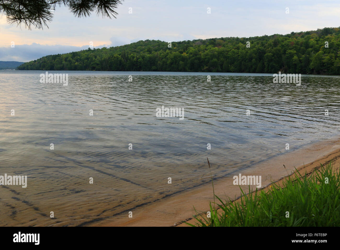 Grand Island beach at sunset on Lake Superior across from Pictured ...