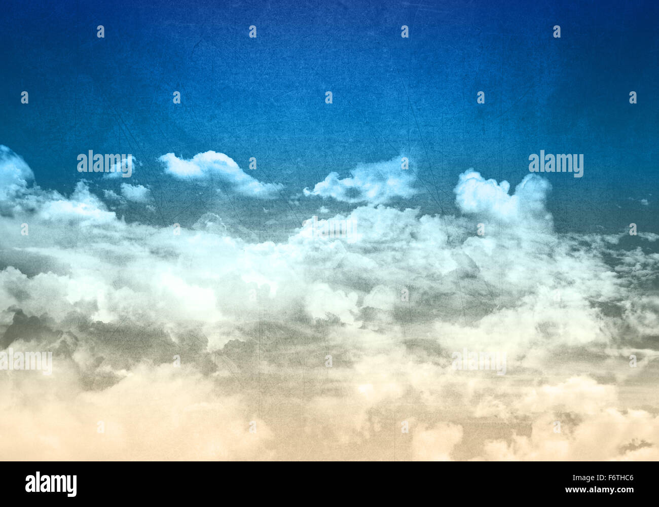 Grunge style blue sky background with fluffy white clouds Stock Photo ...