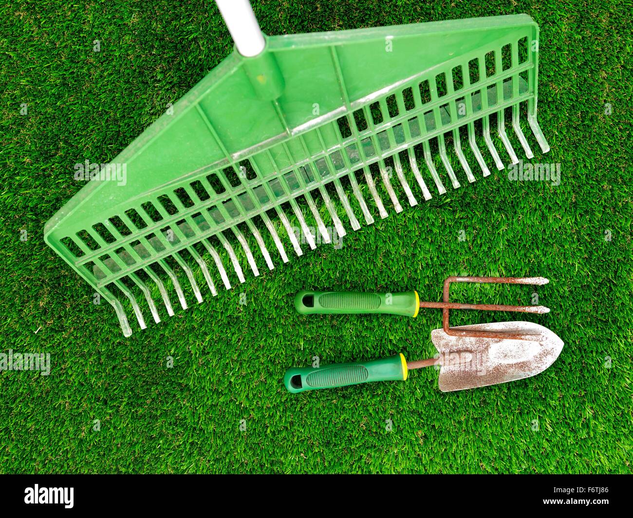 A studio photo of a garden equipment of artificial turf Stock Photo - Alamy