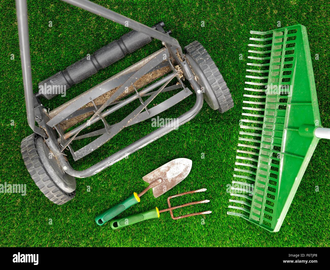 A studio photo of a garden equipment of artificial turf Stock Photo - Alamy
