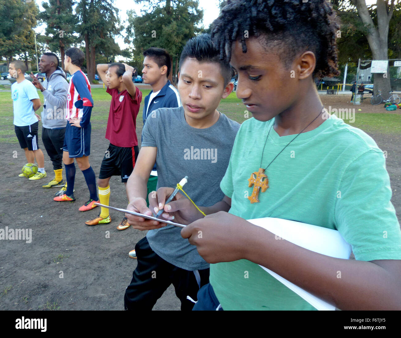 Refugees writing names hi-res stock photography and images - Alamy