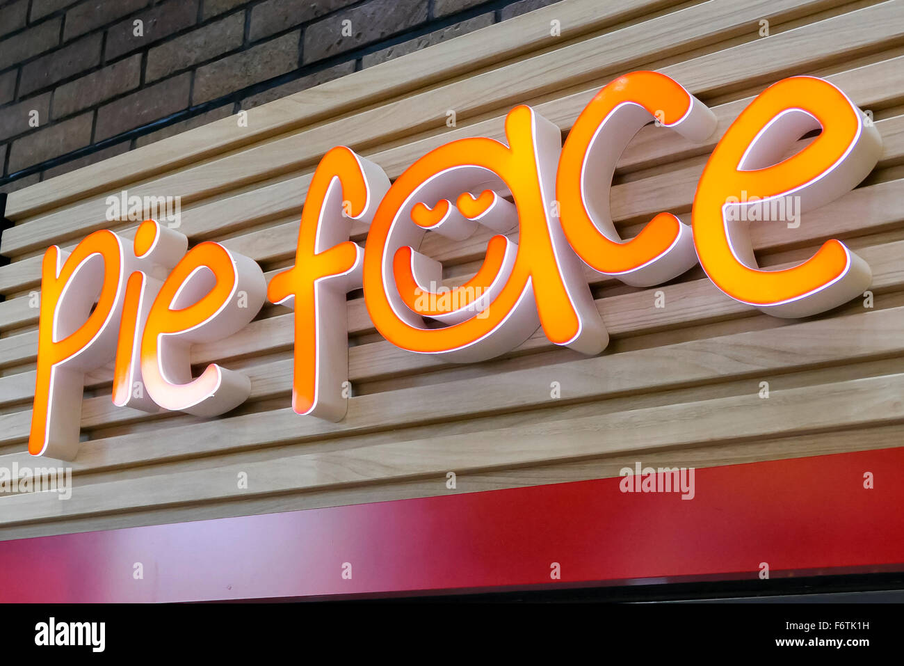 A Pie Face signboard on display outside its store at the new department ...