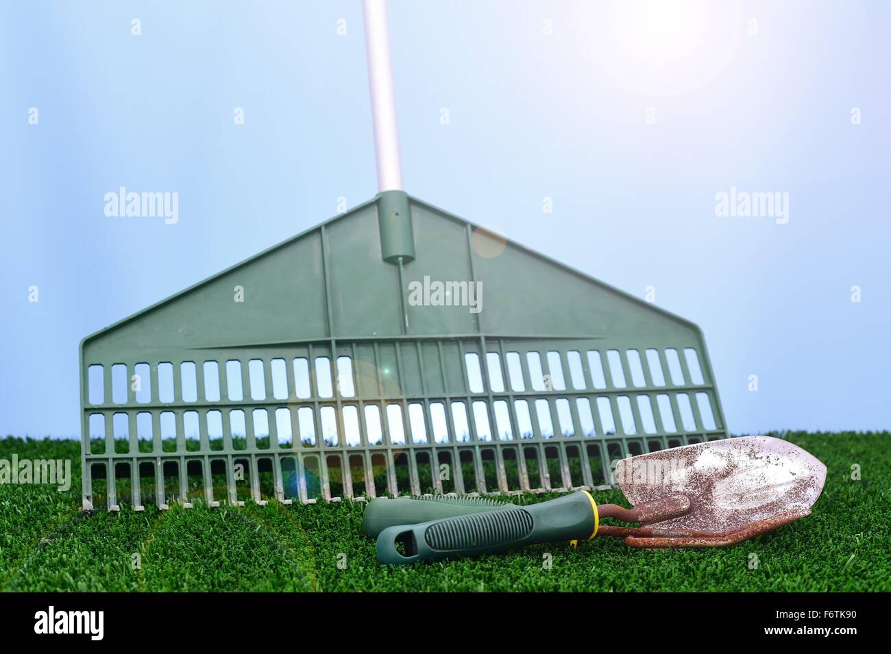 A studio photo of a garden equipment of artificial turf Stock Photo - Alamy