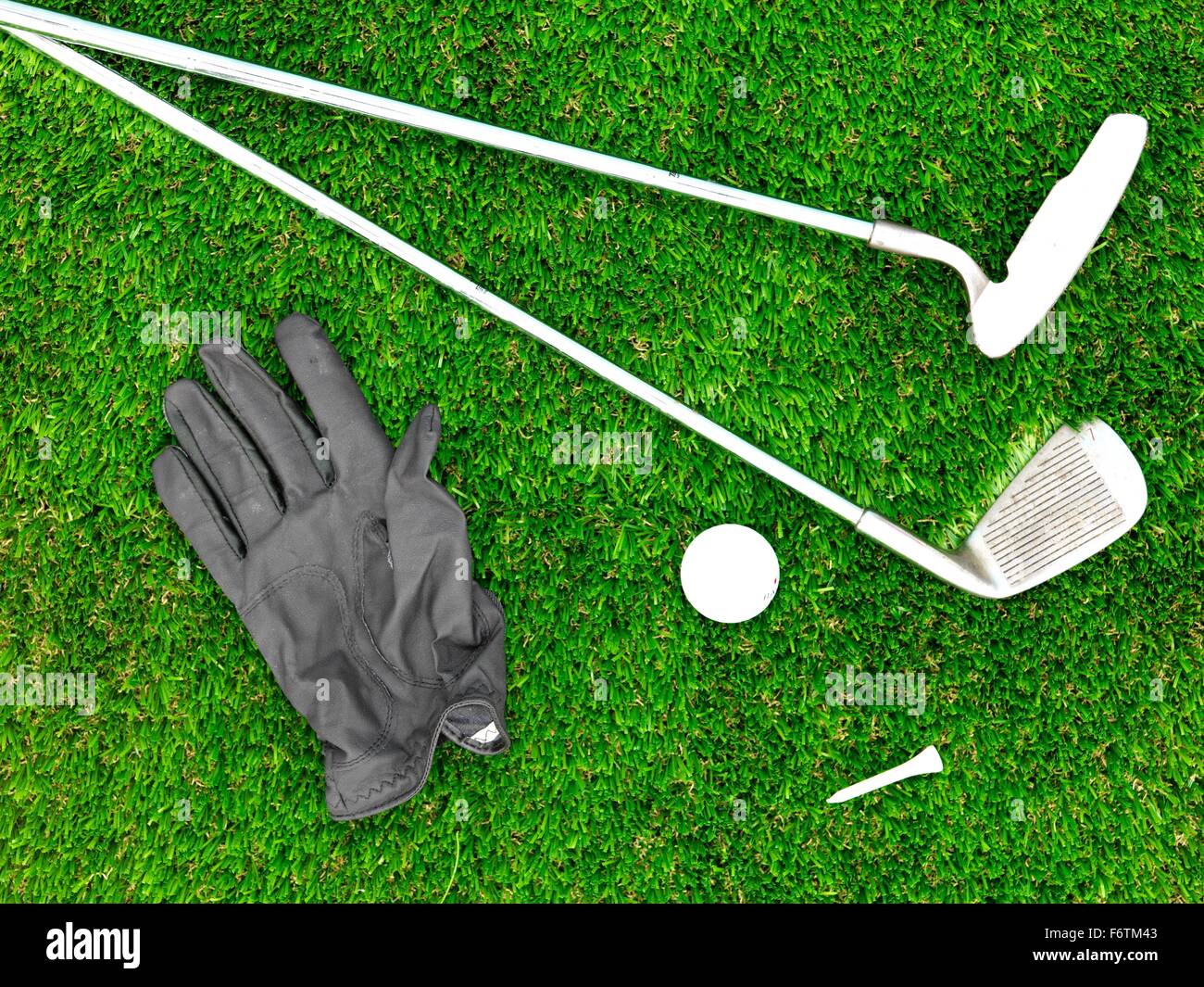 A studio photo of golfing equipment on artificial grass Stock Photo - Alamy