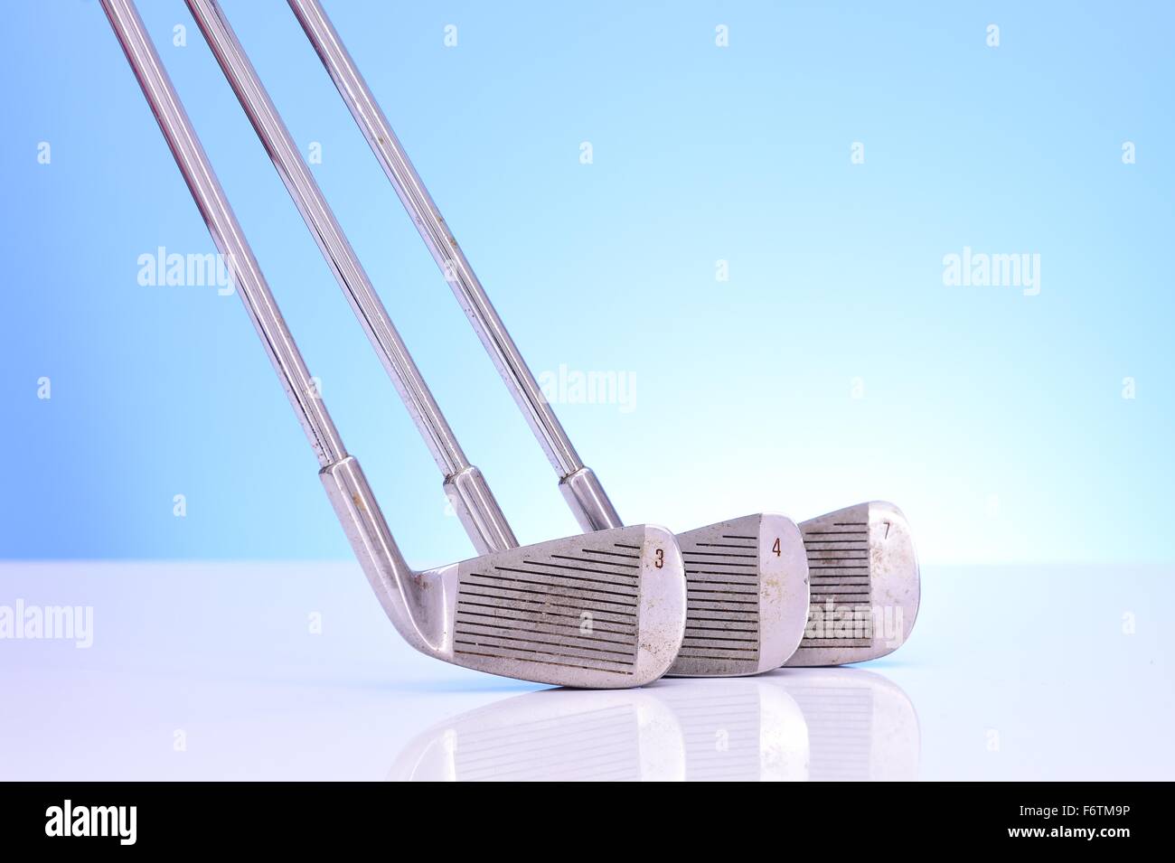 A conceptual studio photo of golfing equipment Stock Photo - Alamy