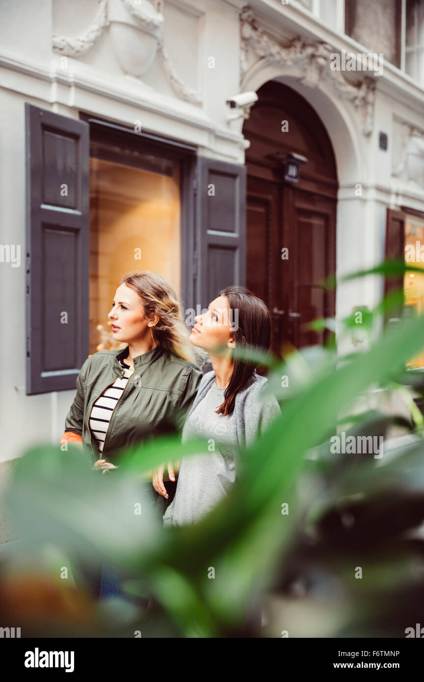 Austria, Vienna, two female friends exploring the old town Stock Photo ...