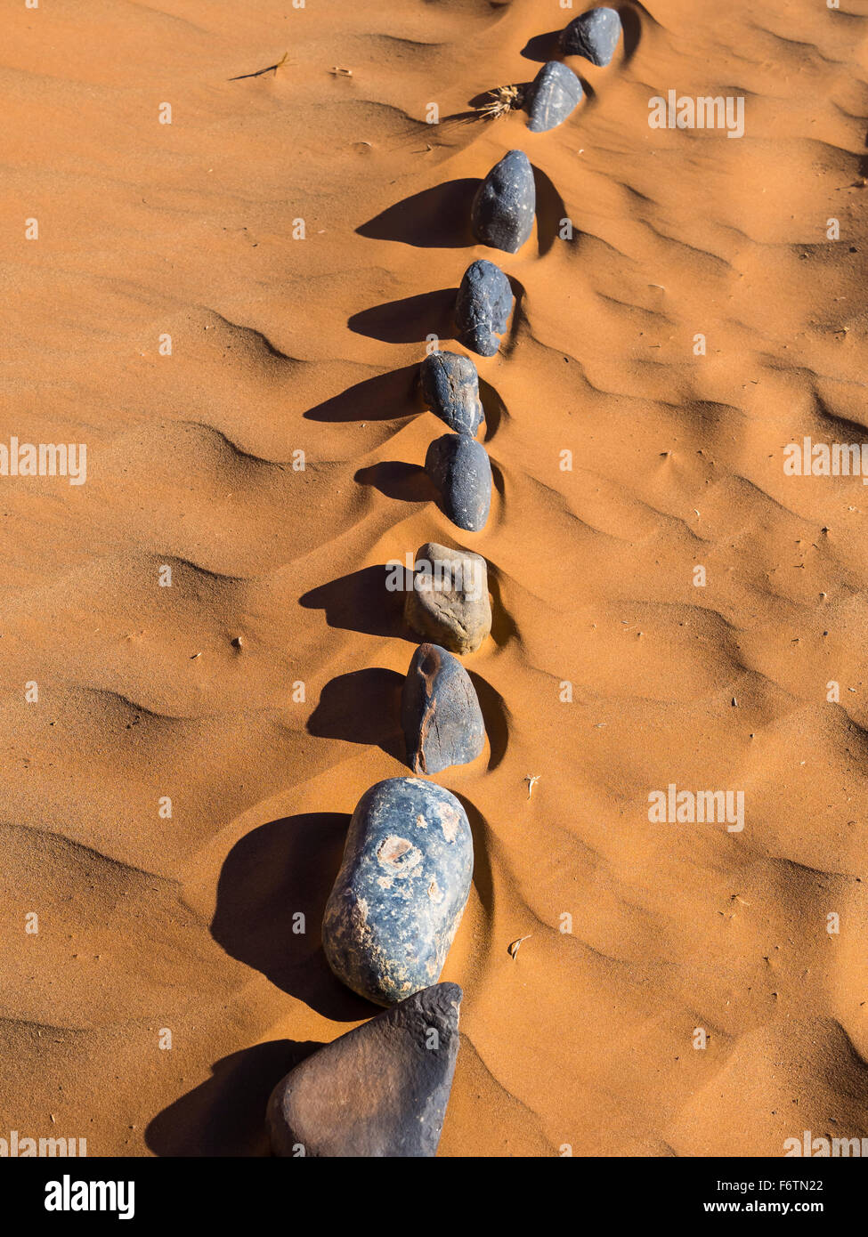 Stones in sand, Kulala Wilderness Reserve Stock Photo - Alamy