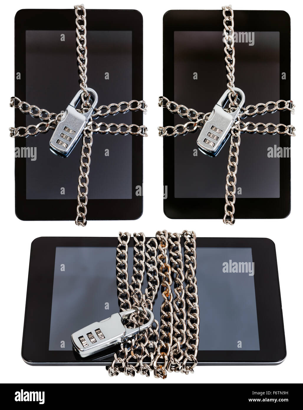 set of tablet pc wrapped by chain and closed by combination lock Stock ...