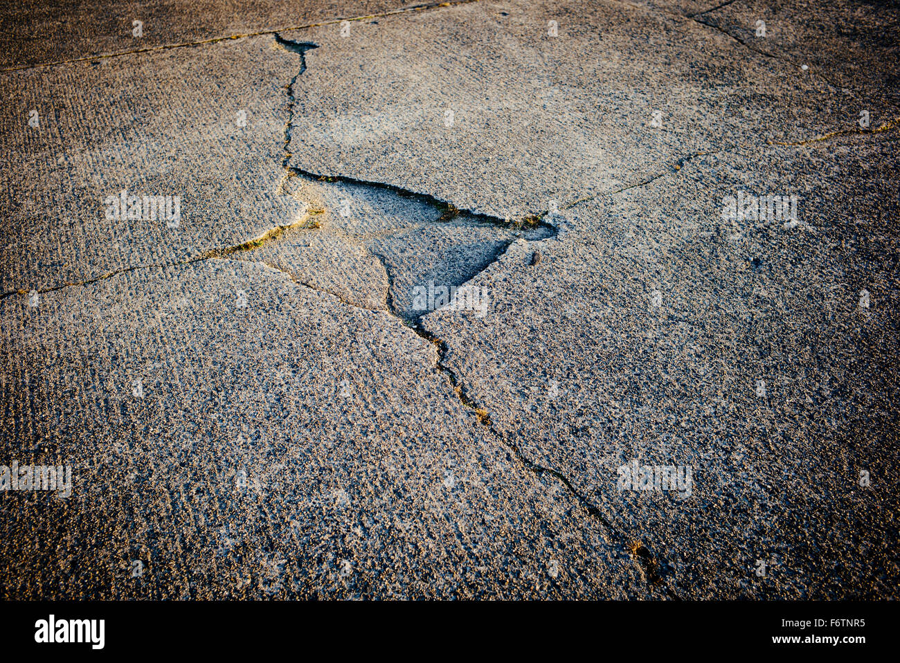 Cracks in a runway Stock Photo - Alamy